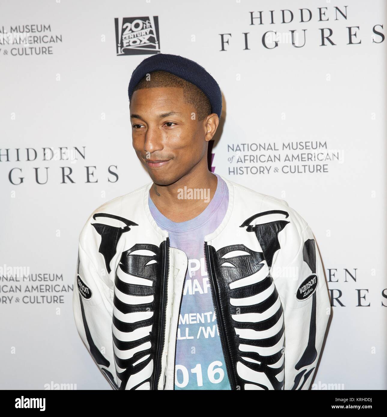 Singer Pharrell Williams walks the red carpet during a screening of the ...