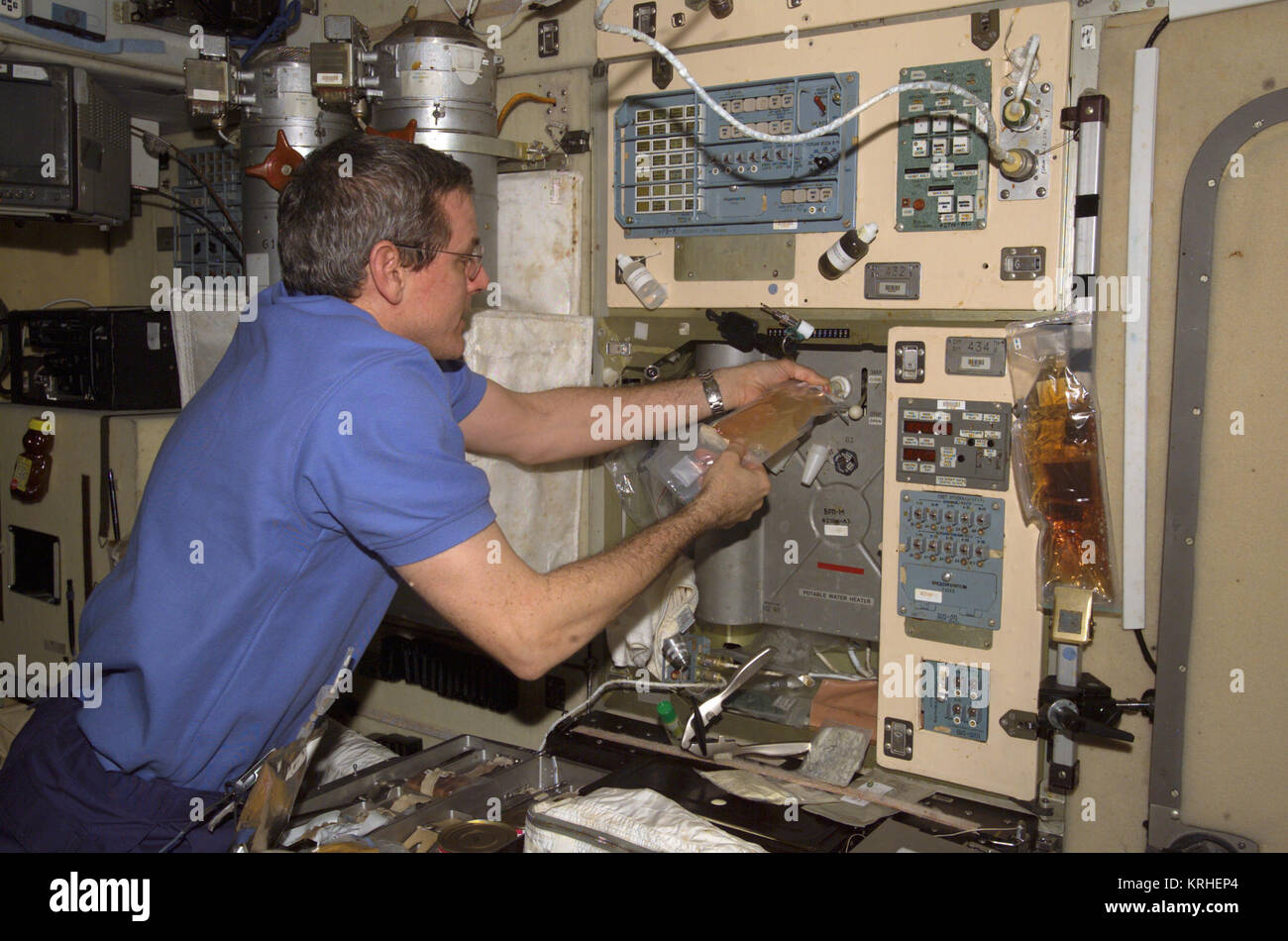 ISS-12 Bill McArthur at the galley in Zvezda Service Module Stock Photo ...