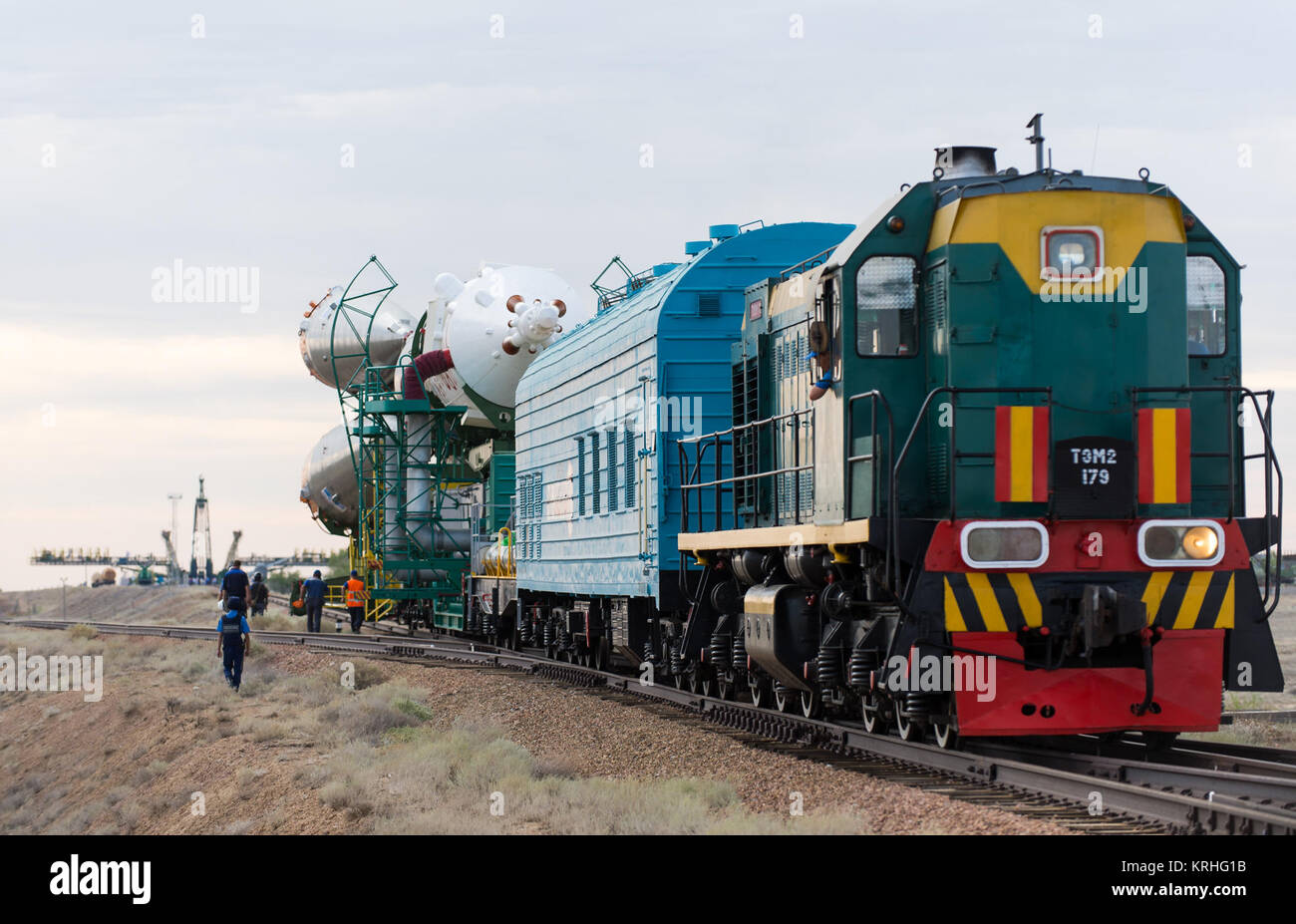The Soyuz TMA-17M spacecraft is rolled out to the launch pad by train ...