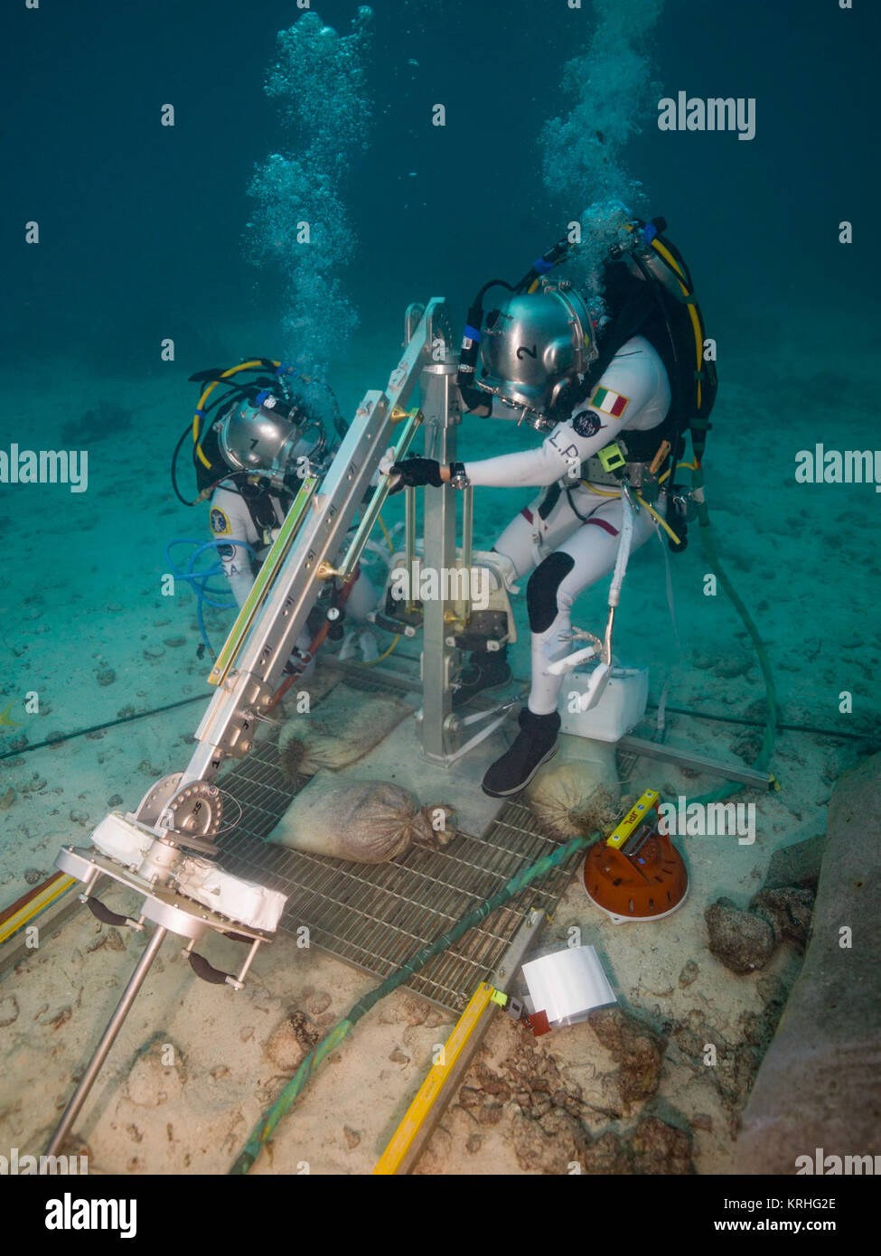NEEMO 20 Crew deploying stabilization boom Stock Photo - Alamy