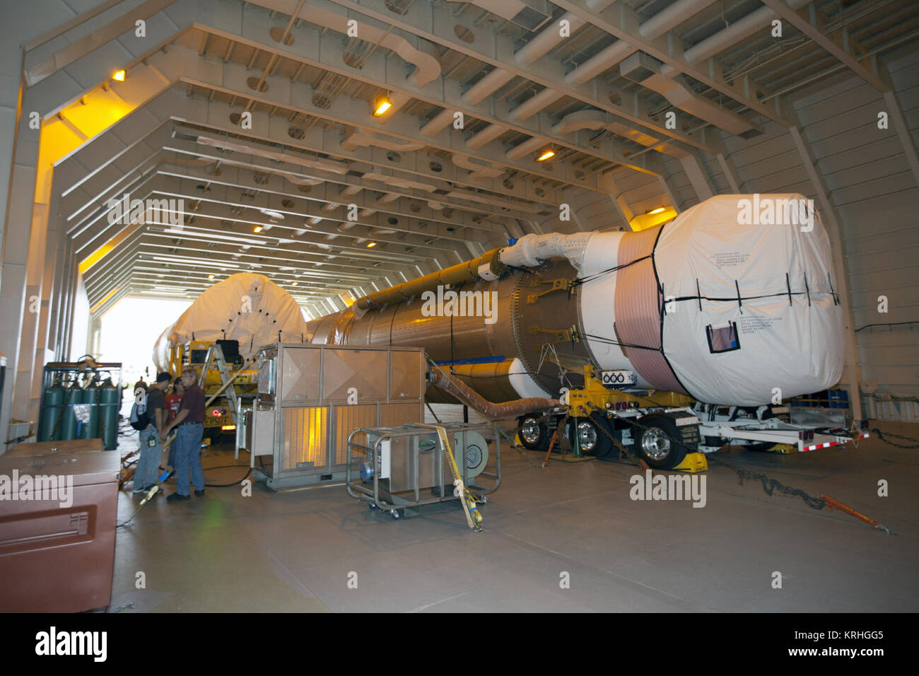 Delta Mariner offloading Atlas V launch vehicle for TDRS-L mission (KSC ...