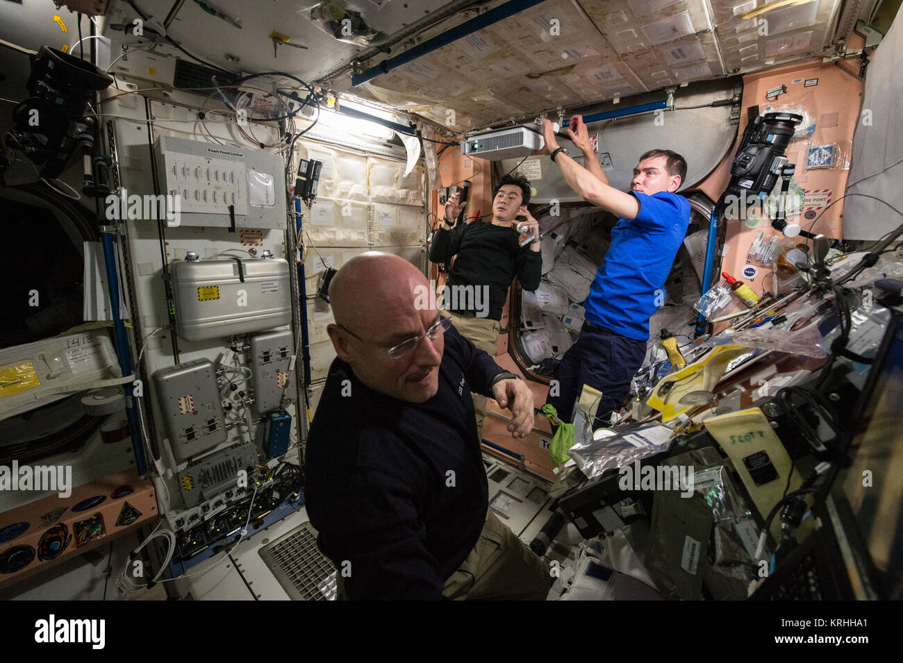 ISS-44 Scott Kelly, Kimiya Yui and Sergey Volkov in the Unity module Stock Photo - Alamy