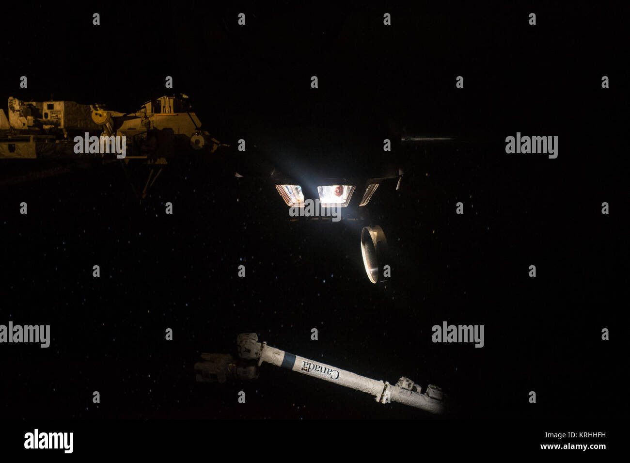 ISS-45 Scott Kelly peeking out of the Cupola module Stock Photo - Alamy