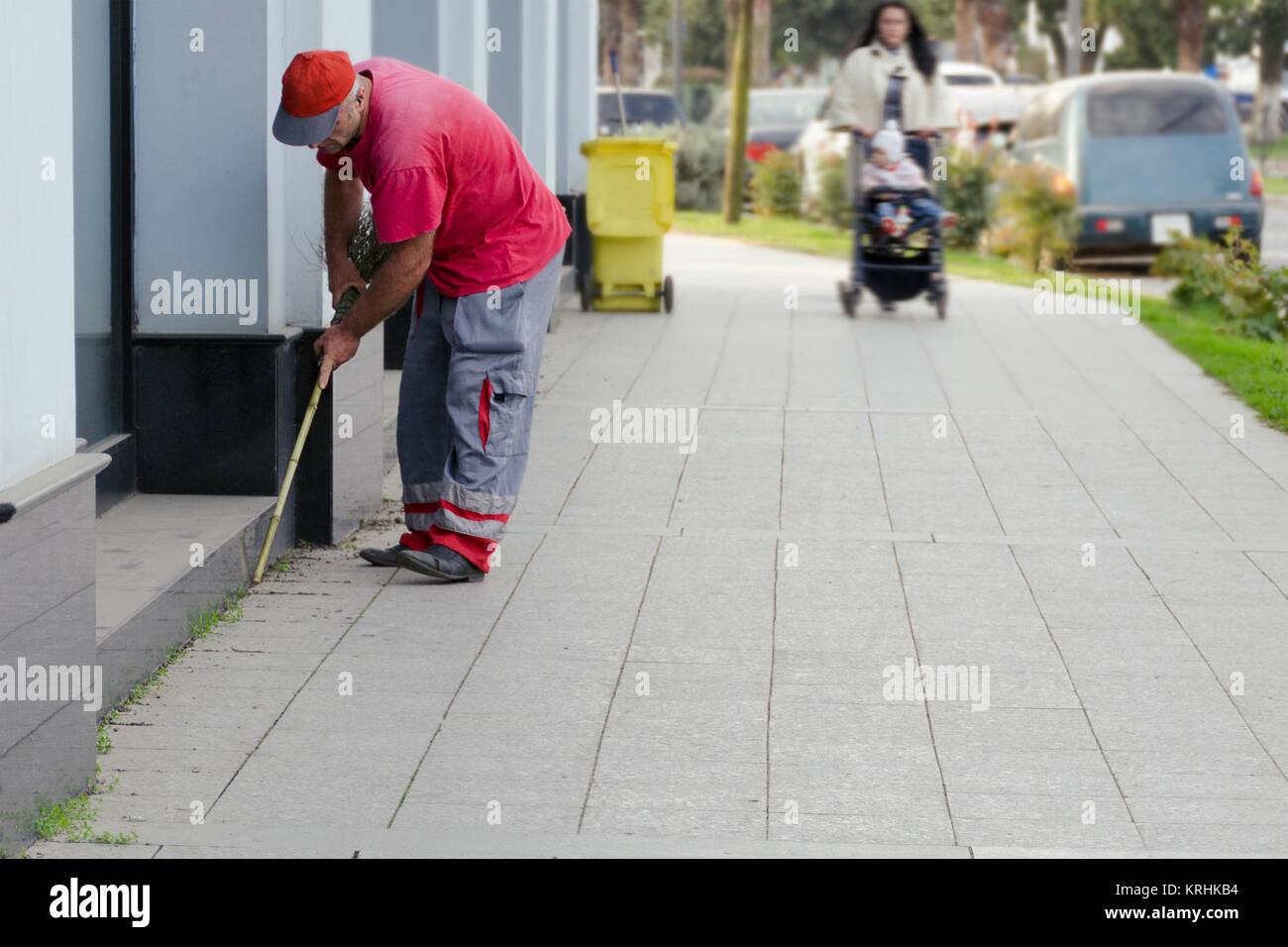 Cleaner sweeping uniform urban hi-res stock photography and images - Alamy