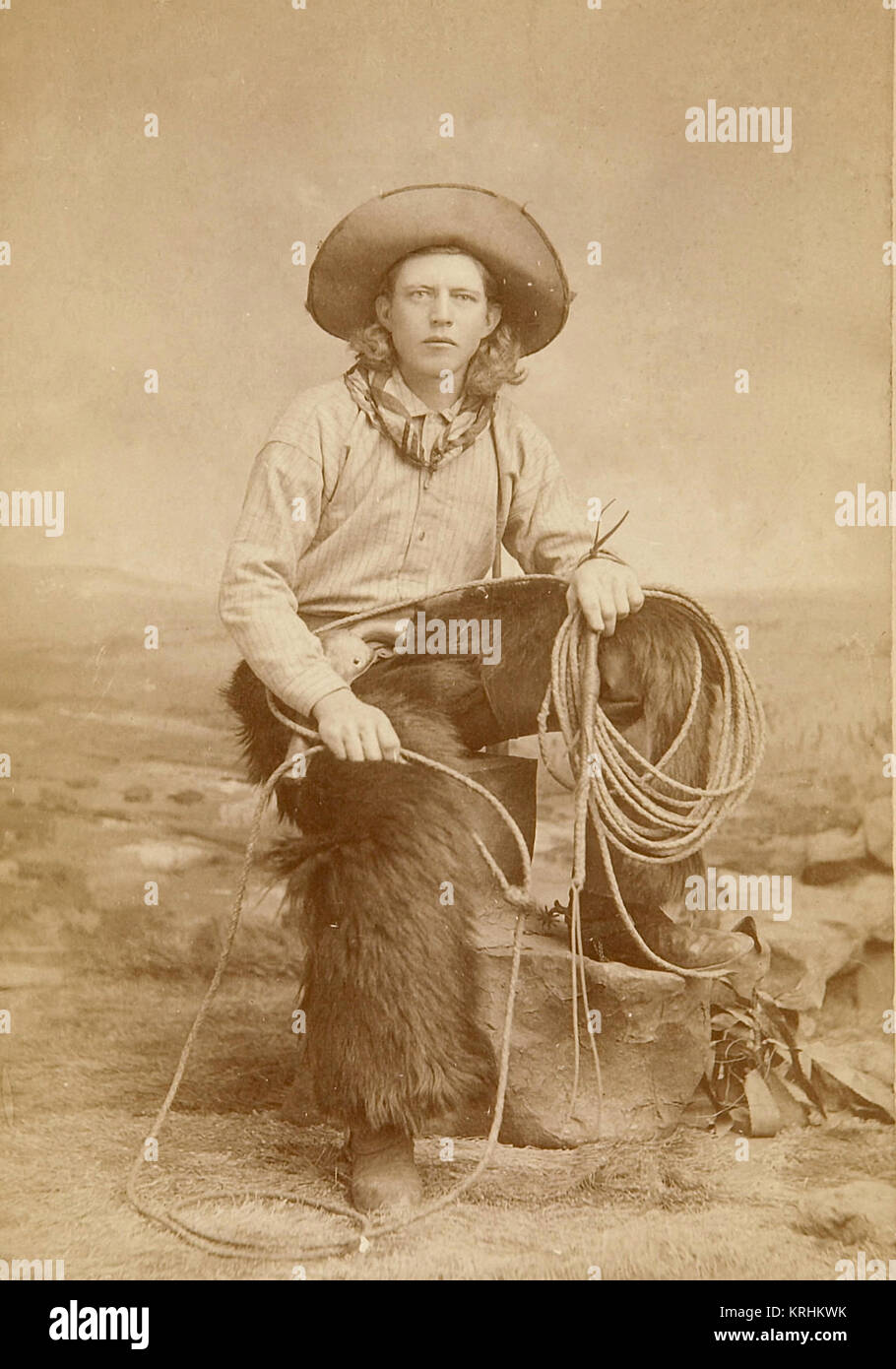 Handsome Cowboy With Lariat Stock Photo - Alamy