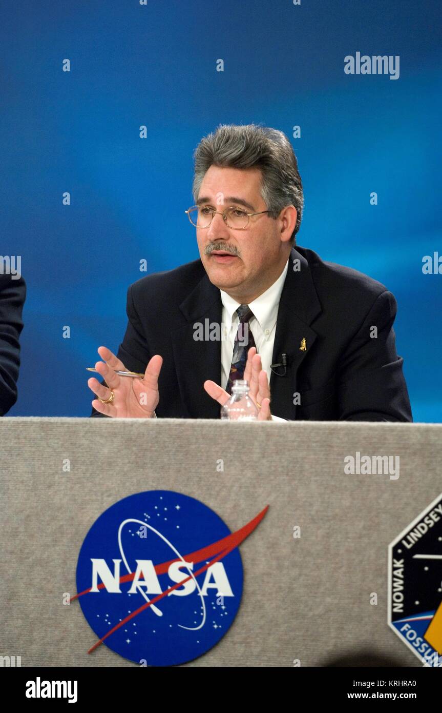NASA Orbiter Projects Office Manager Steve Poulos speaks during a ...
