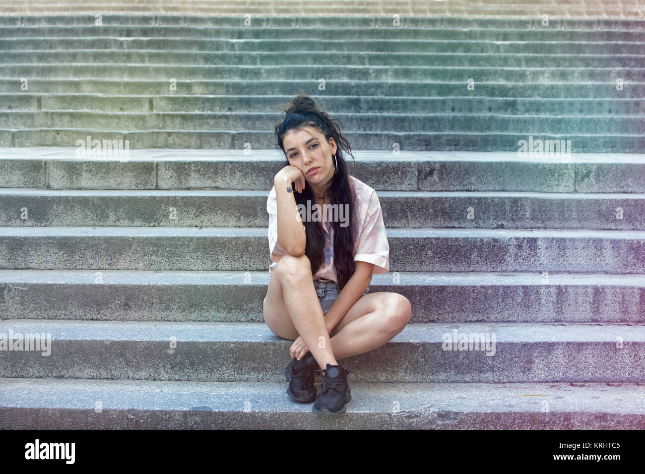 portrait young woman in stairs Stock Photo - Alamy