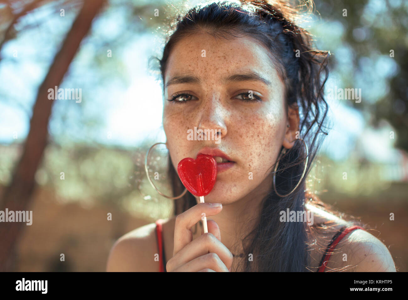 portrait young woman with candy Stock Photo - Alamy