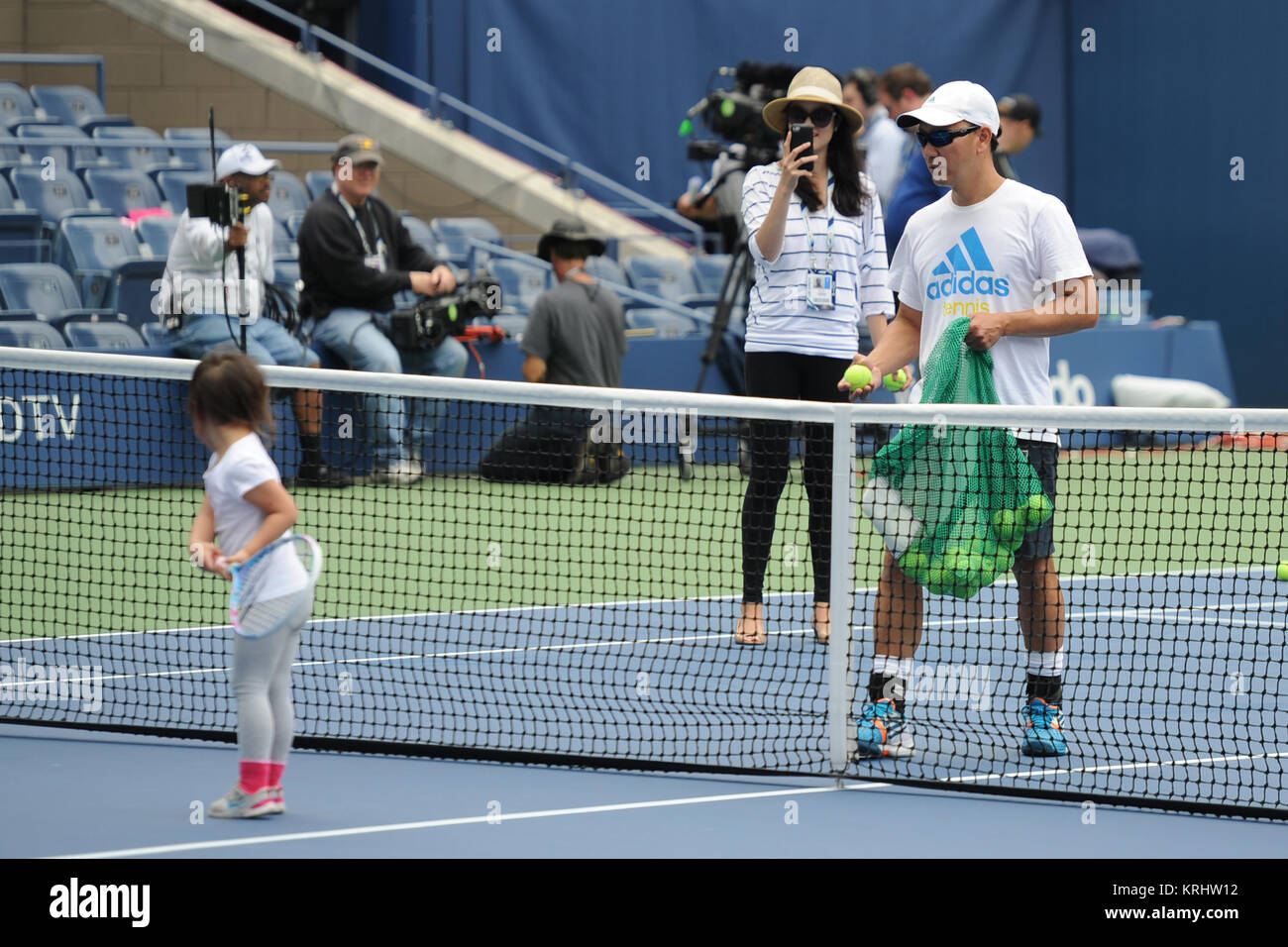 NEW YORK, NY - AUGUST 22: Andrea Chang, Michael Chang on the practice ...