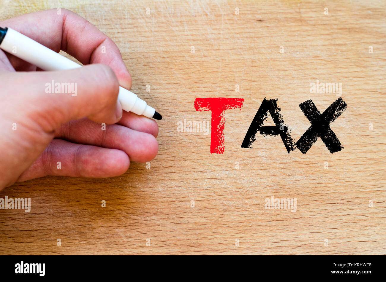 Tax text concept Stock Photo - Alamy