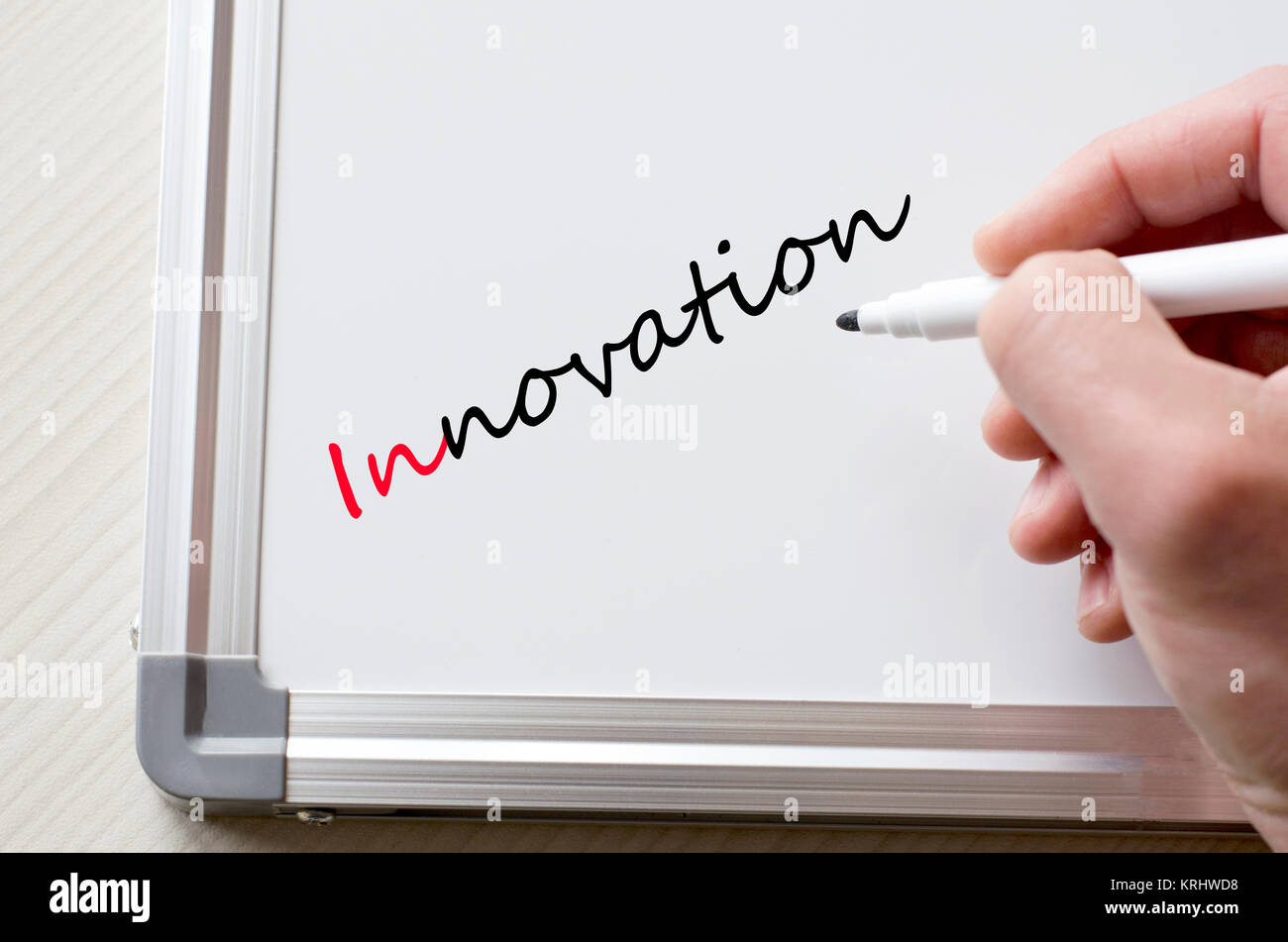 Innovation written on whiteboard Stock Photo - Alamy