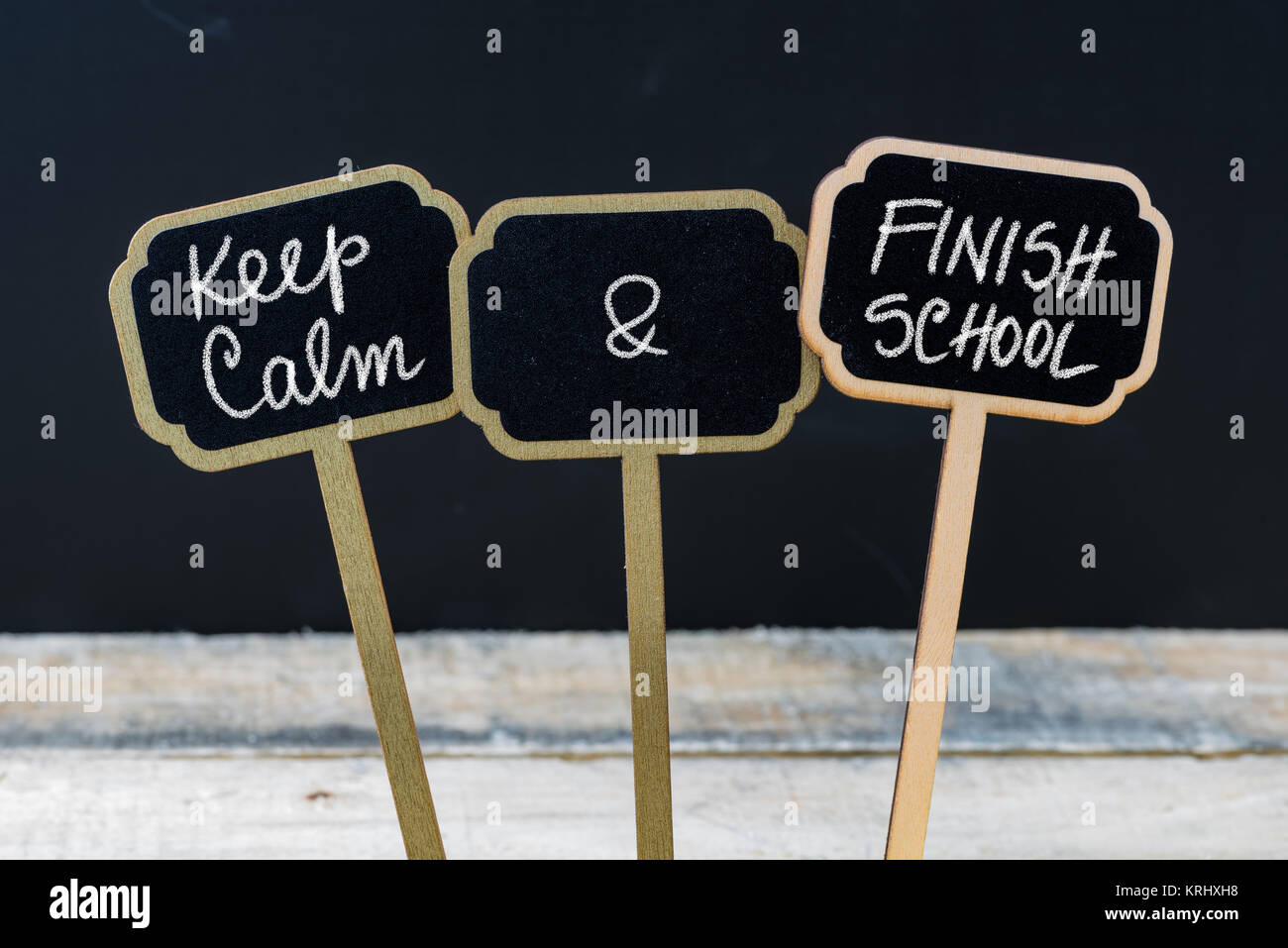 Keep Calm and Finish School message written with chalk on mini ...