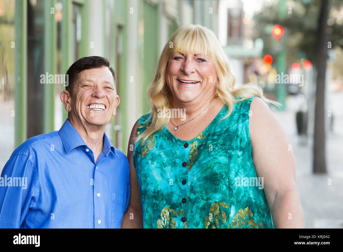 Happy transgender male and female outside Stock Photo - Alamy