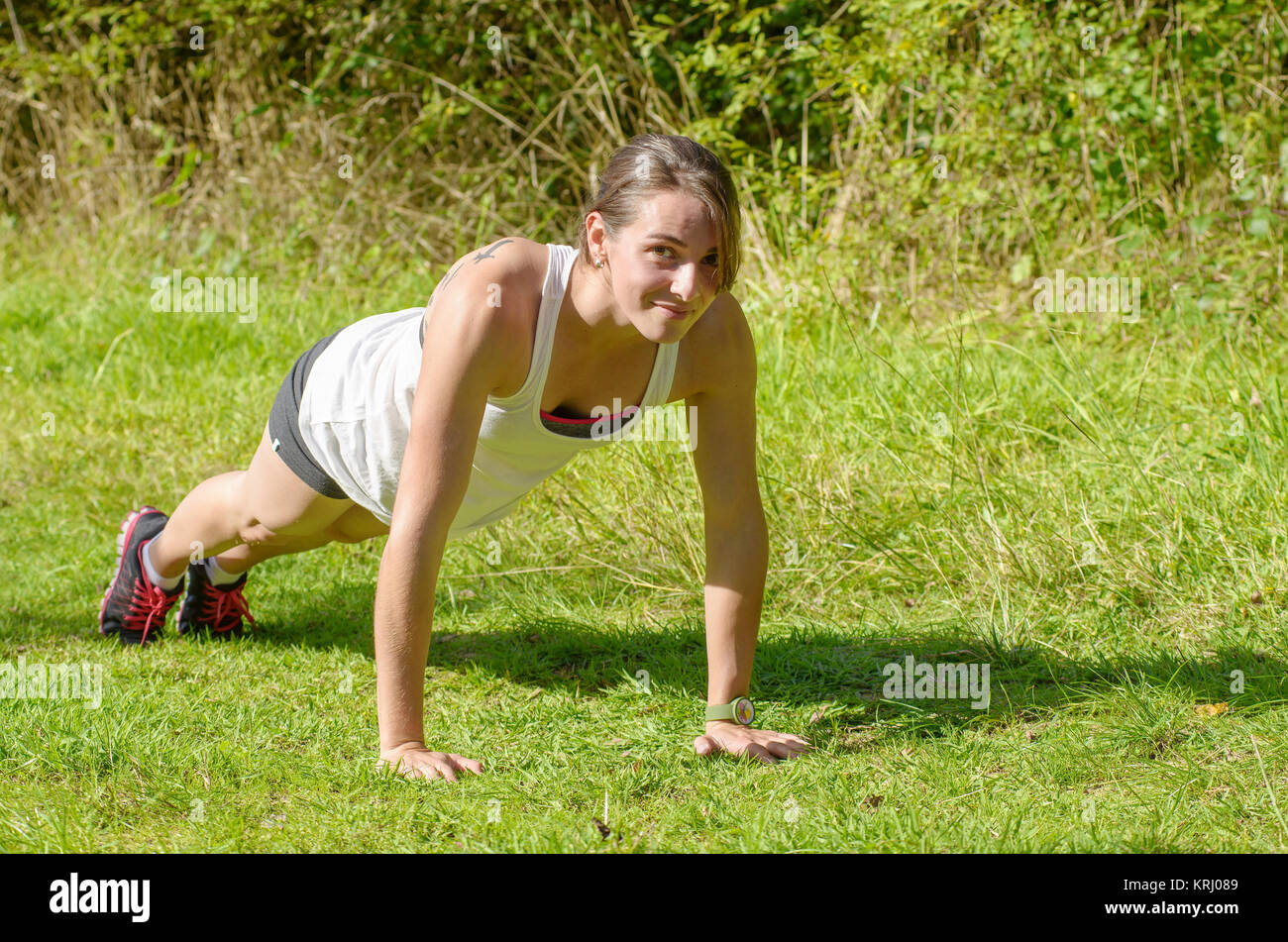 Fitness woman doing exercise Stock Photo - Alamy
