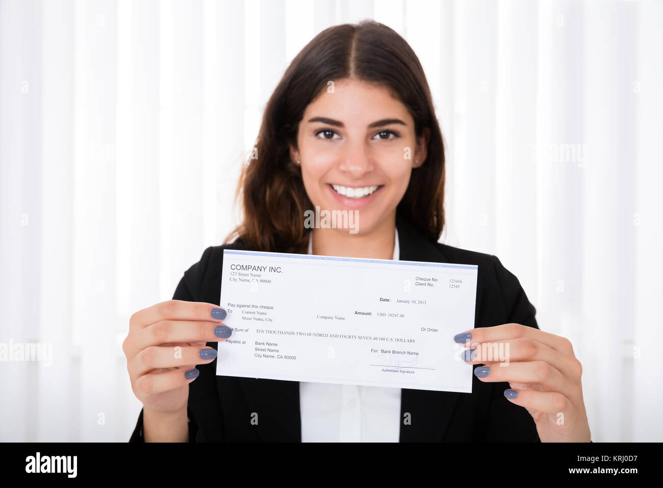 Cashier bank cheque hi-res stock photography and images - Alamy
