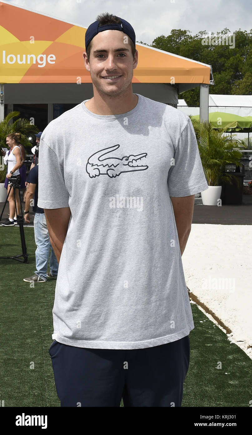 KEY BISCAYNE, FL - MARCH 24: John Isner speaks to the media during Day ...