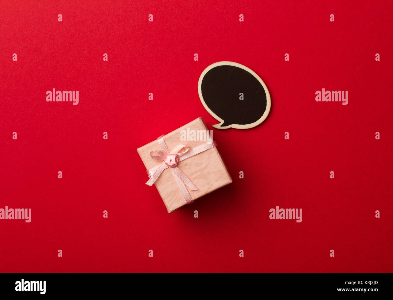 Concept little gift box with wooden speech bubble for messages Stock ...