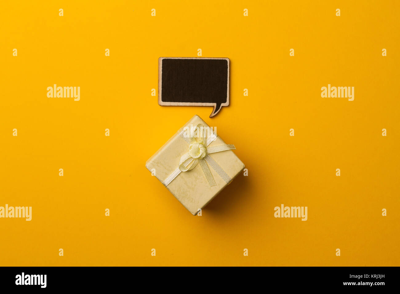 Concept little gift box with wooden speech bubble for messages Stock ...