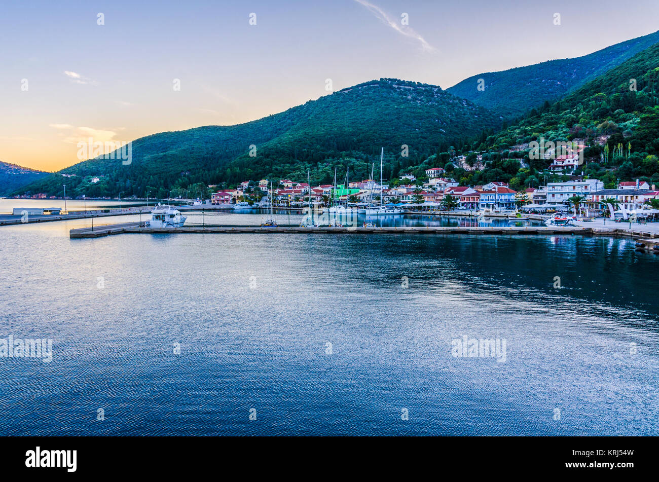 Panoramic view from the sea of the port of Sami with its moorings the ...