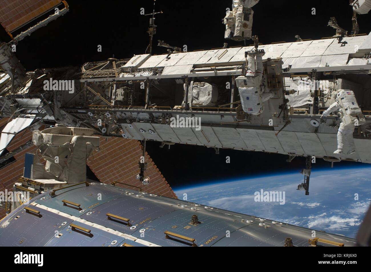 STS-119 EVA 3 Arnold and Acaba2 Stock Photo - Alamy