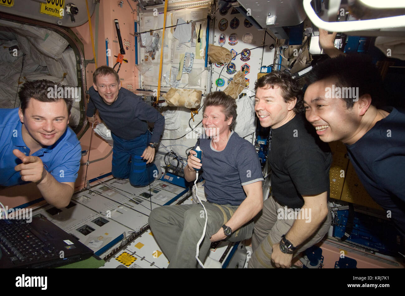 ISS-20 crew members view a monitor in the Unity node Stock Photo - Alamy