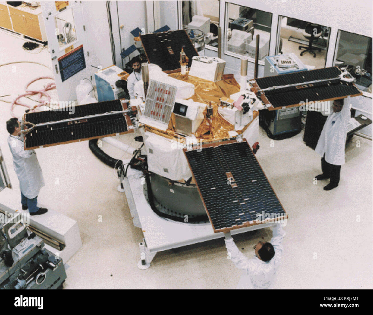 Scientists holding the solar panels of the Advanced Composition ...