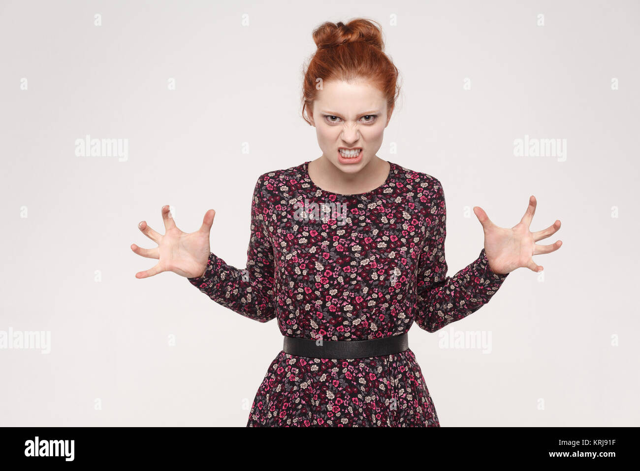 Roar! Anger ginger woman shout at camera. Bad emotions and feelings ...