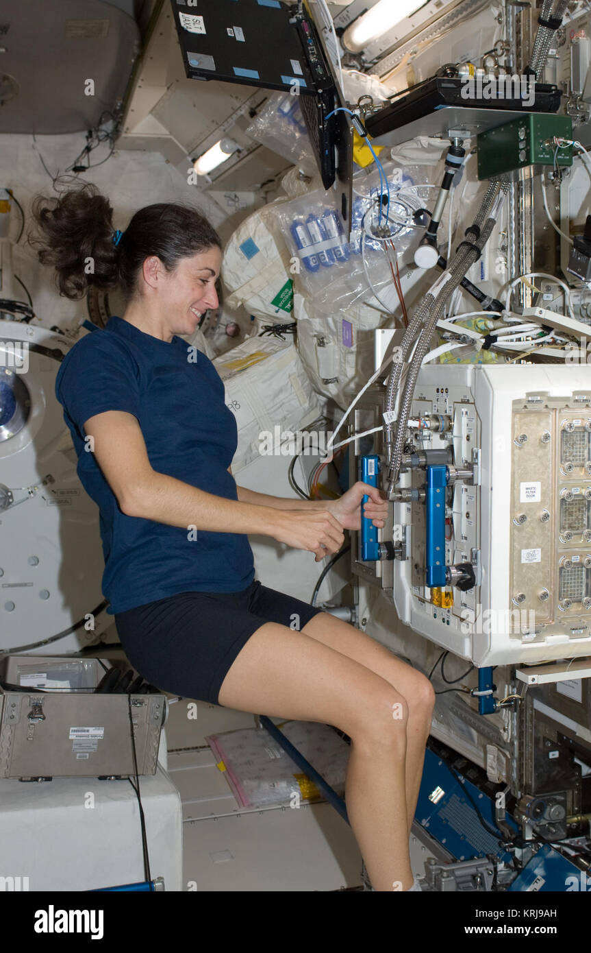 ISS-20 Nicole Stott works with the Mice Drawer System (MDS) in the Kibo ...