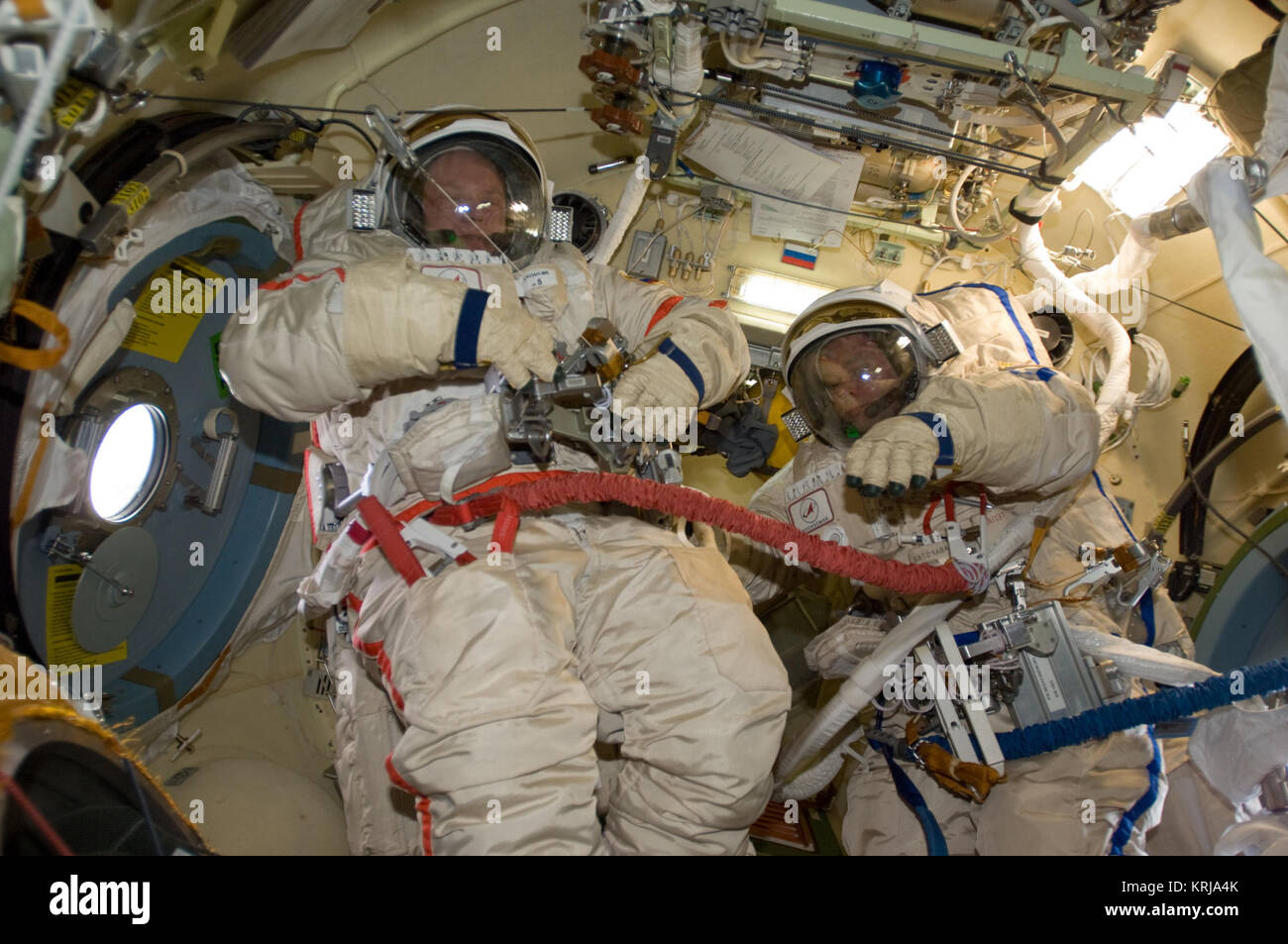 ISS-22 Oleg Kotov and Maxim Suraev in the Poisk module Stock Photo - Alamy