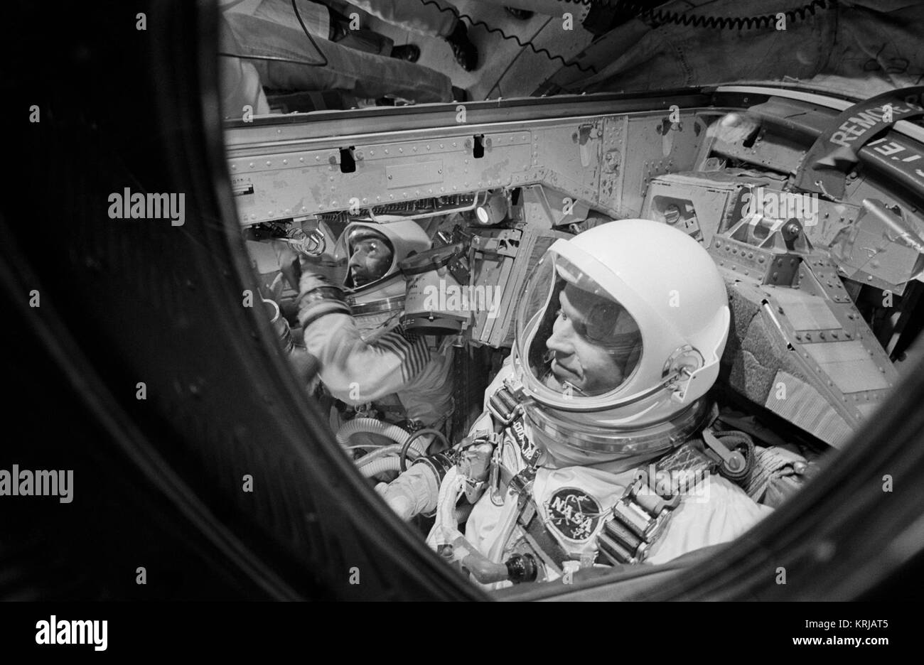Astronauts L. Gordon Cooper Jr. (foreground) and Charles Conrad Jr. are ...
