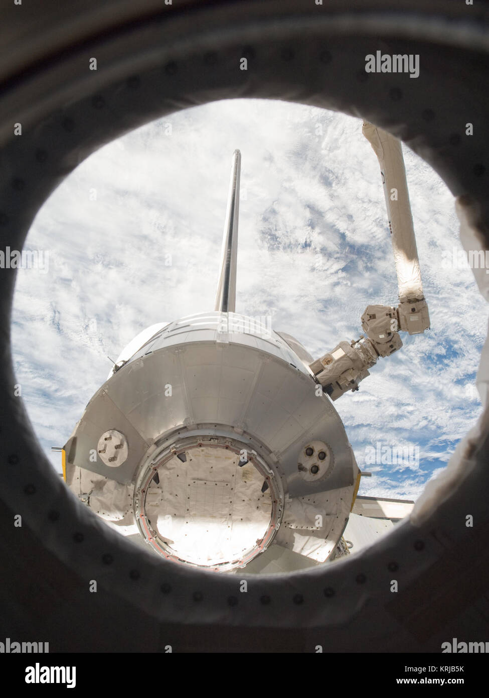 STS-131 The Leonardo MPLM is placed back in Discovery's payload bay ...