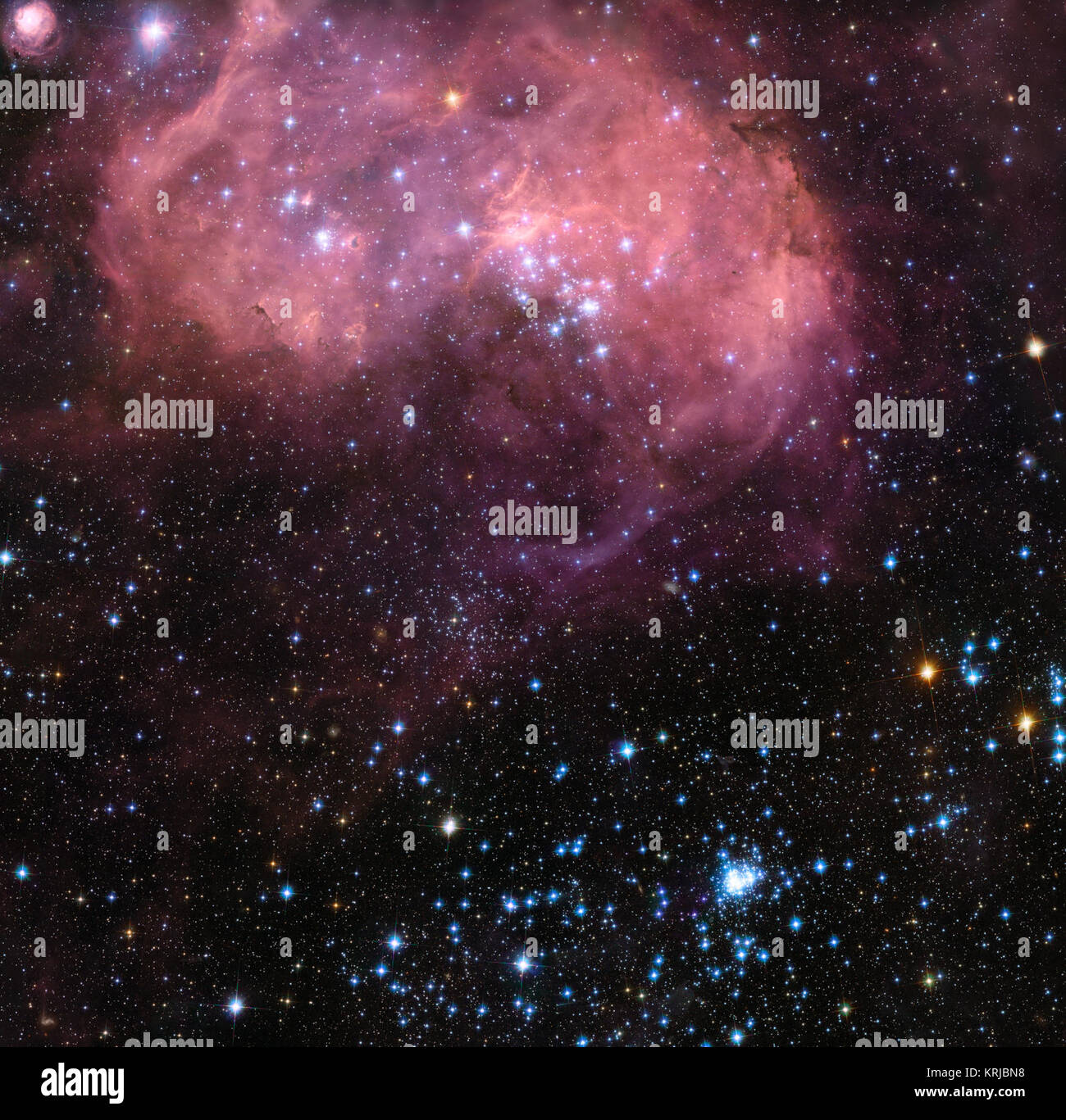 This broad vista of young stars and gas clouds in our neighbouring ...