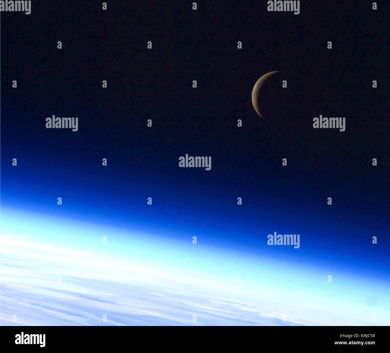 Crescent moon from space Stock Photo - Alamy