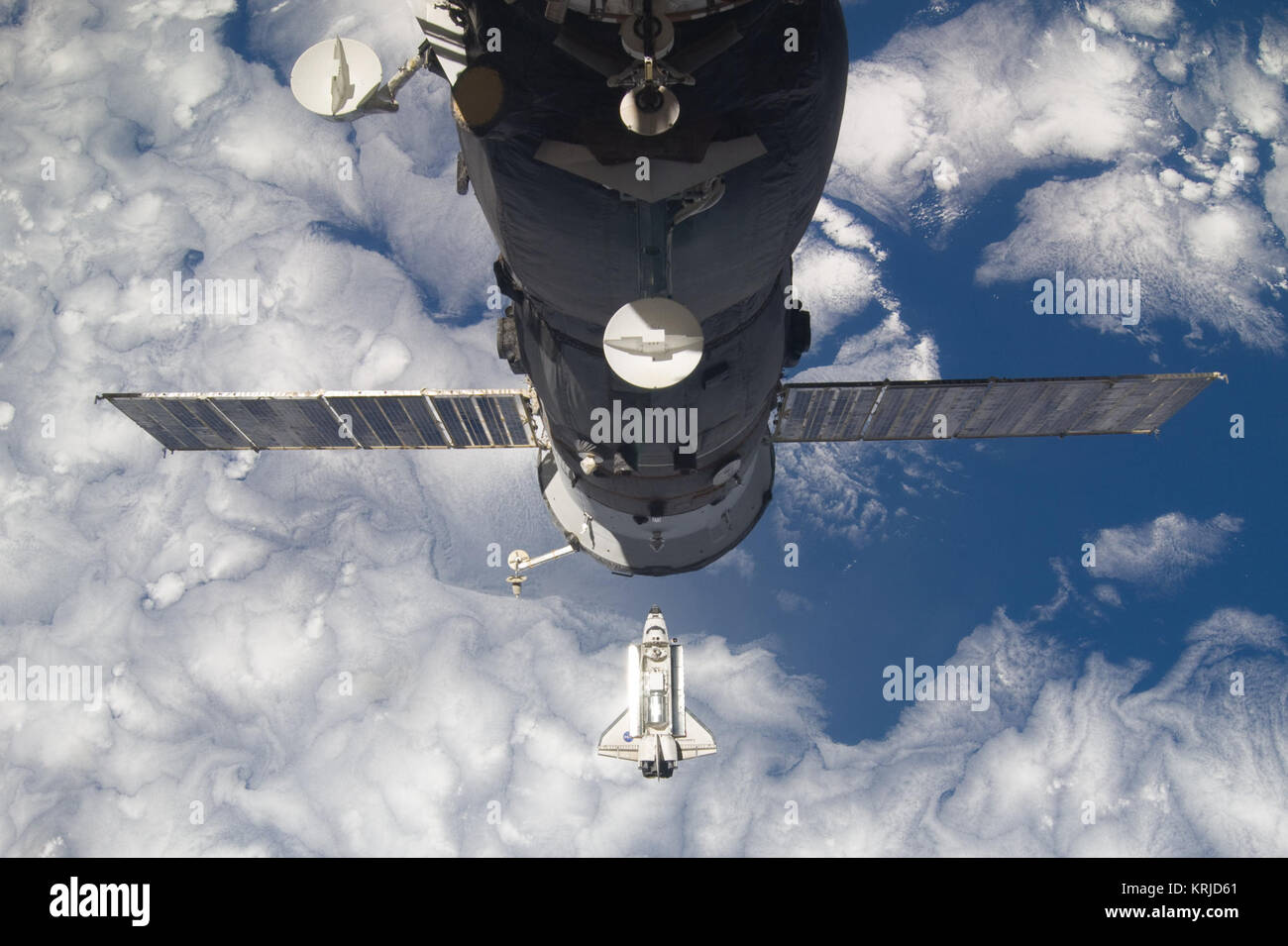 STS-133 Discovery approaches the ISS Stock Photo - Alamy