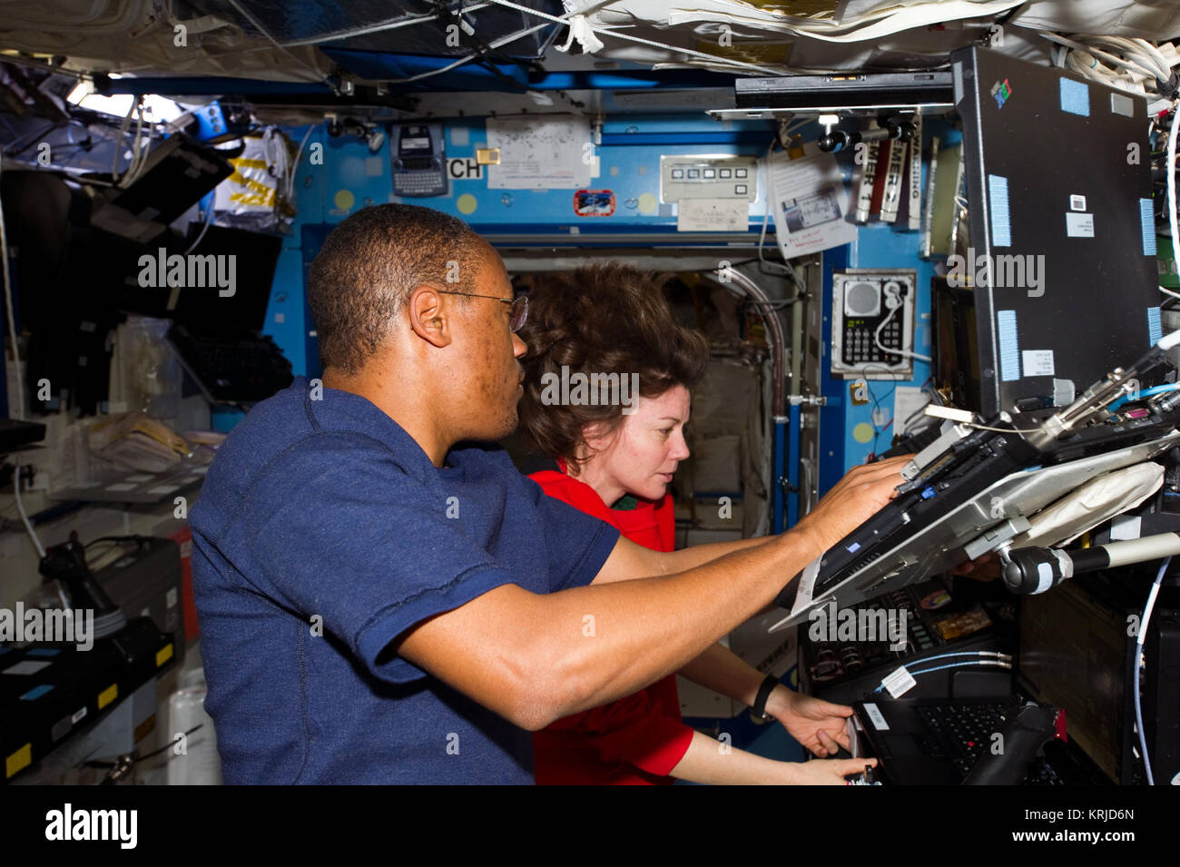 STS-133 ISS-26 Alvin Drew and Cady Coleman Stock Photo - Alamy