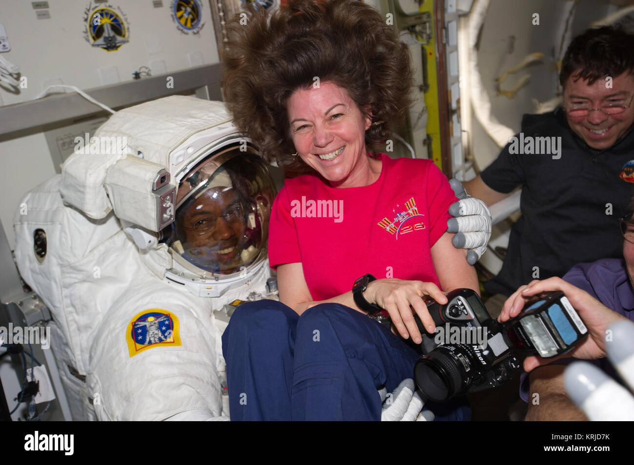 STS-133 ISS-26 Alvin Drew jokes with Cady Coleman Stock Photo - Alamy