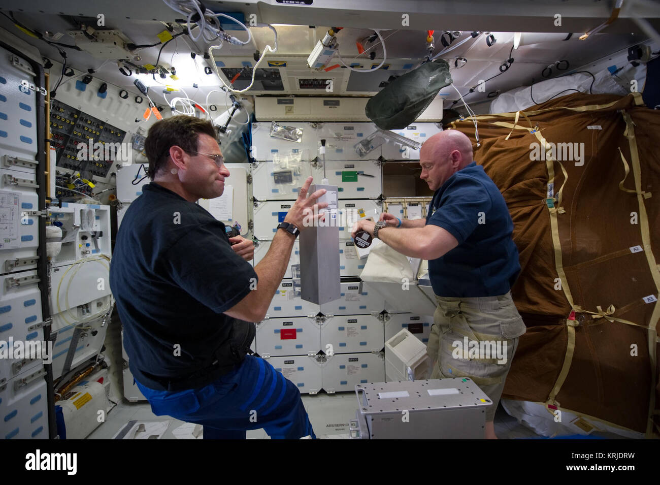STS-134 Greg Chamitoff and Mark Kelly on Endeavour's middeck Stock ...