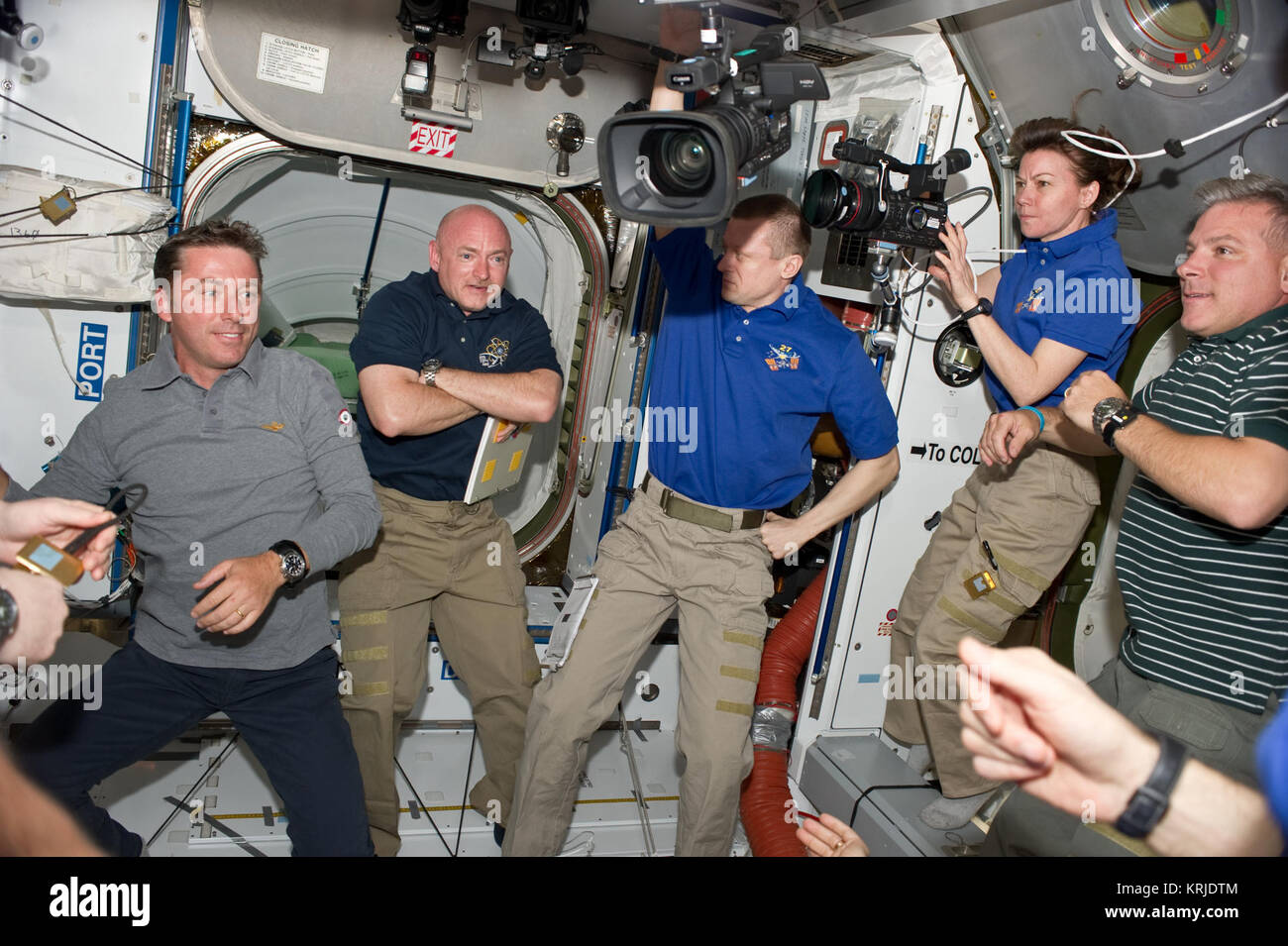 Expedition 27 and STS-134 crew members shortly after the hatches were ...