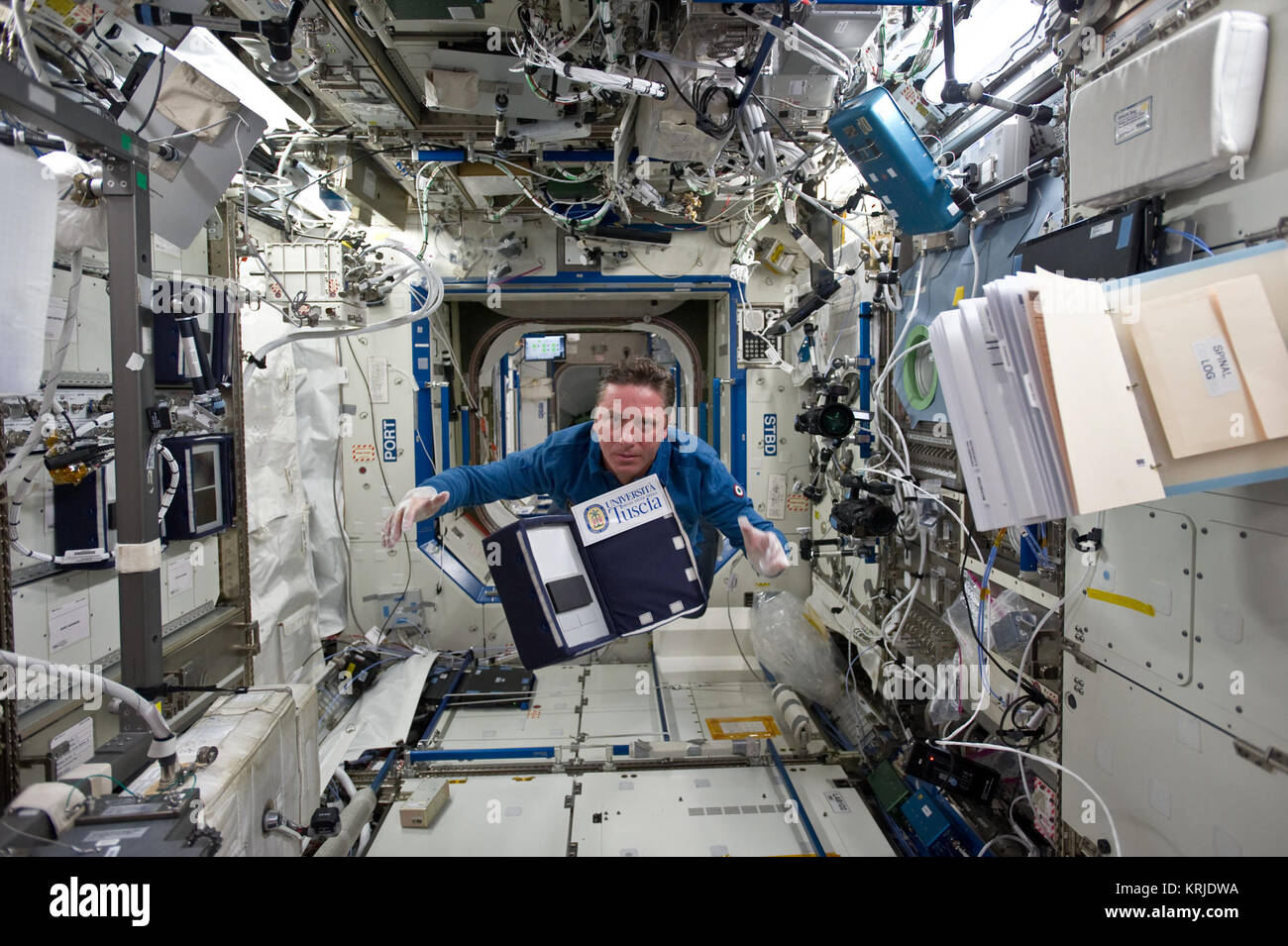 STS-134 Roberto Vittori floats through the Destiny lab Stock Photo - Alamy