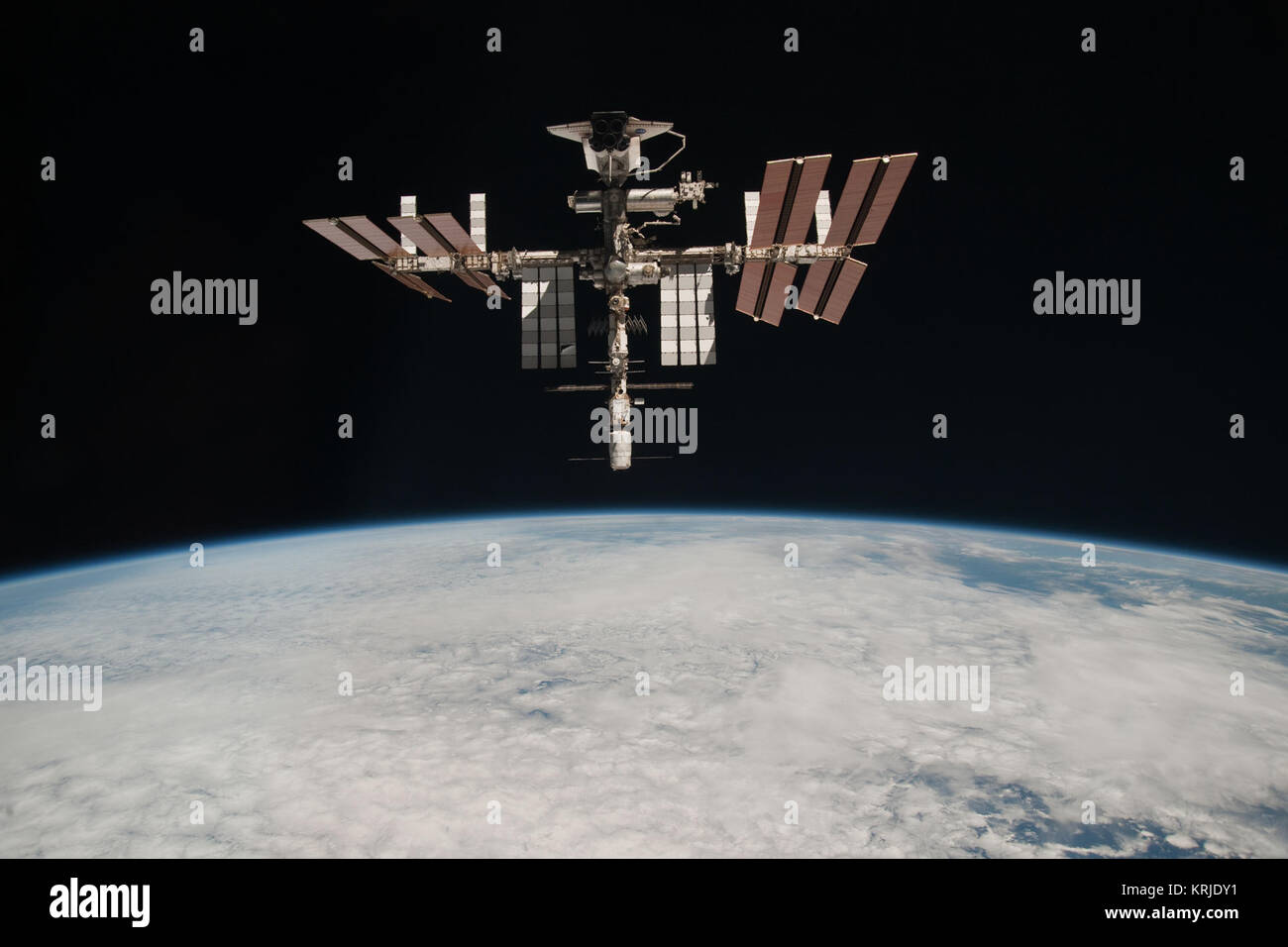 ISS and Endeavour seen from the Soyuz TMA-20 spacecraft 04 Stock Photo ...