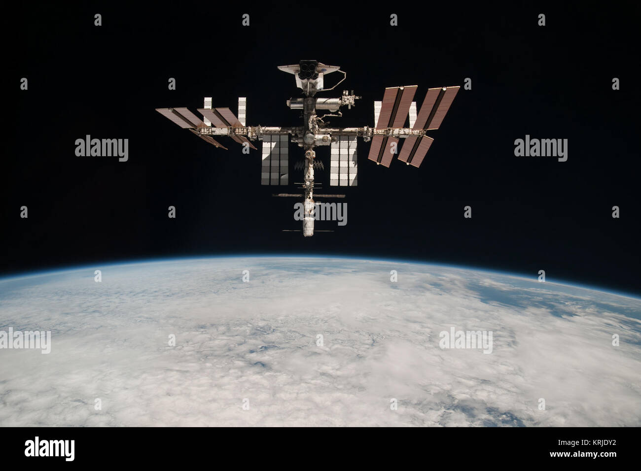 ISS and Endeavour seen from the Soyuz TMA-20 spacecraft 05 Stock Photo ...