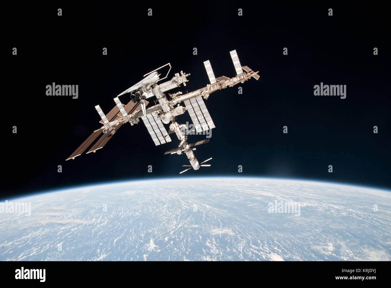 ISS and Endeavour seen from the Soyuz TMA-20 spacecraft 10 Stock Photo ...