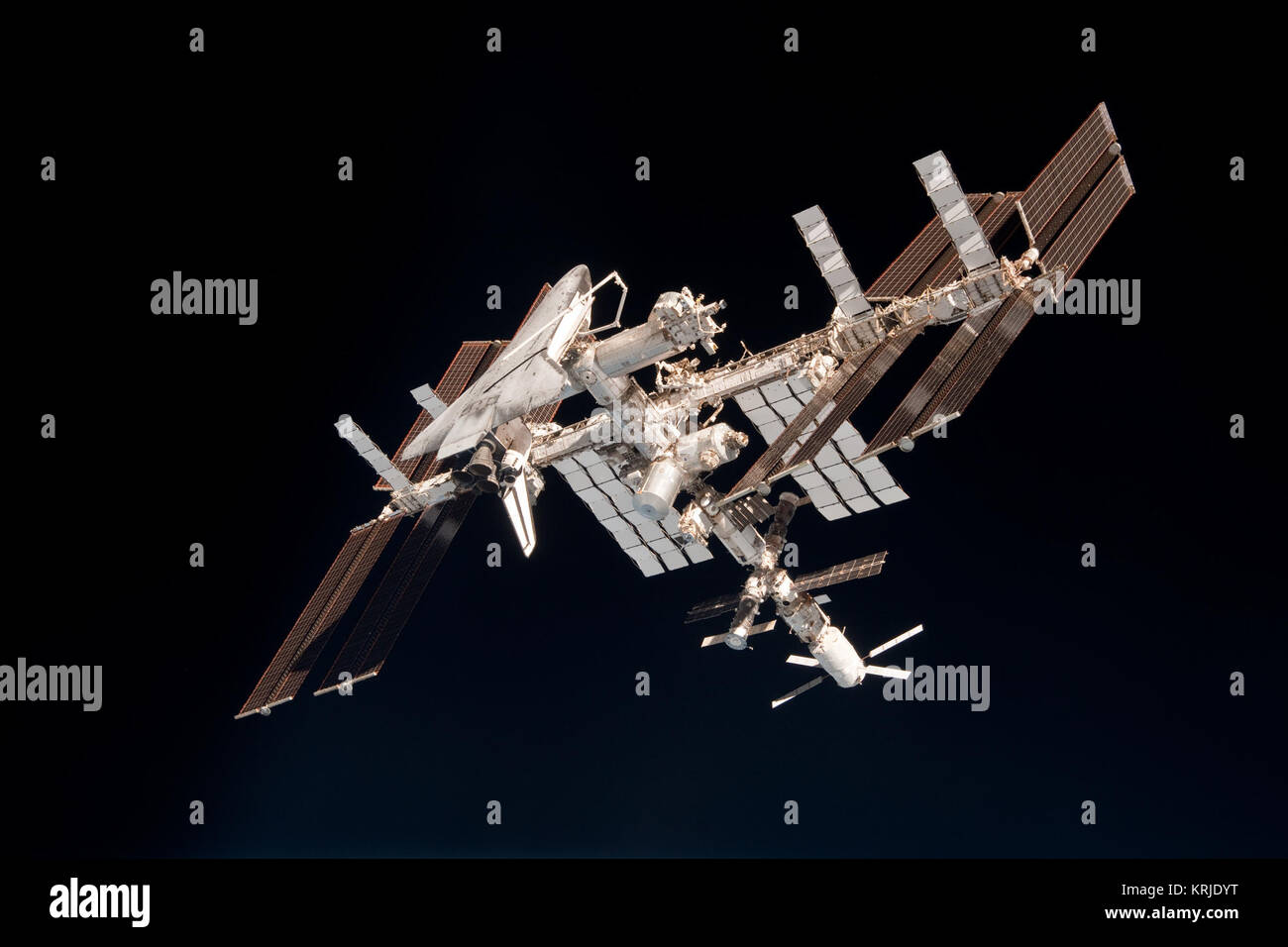 ISS and Endeavour seen from the Soyuz TMA-20 spacecraft 14 Stock Photo ...