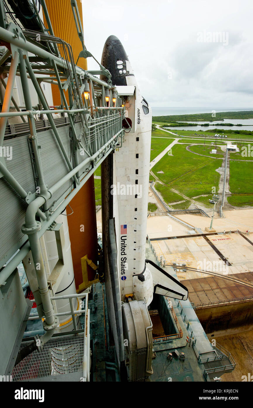 The space shuttle Atlantis is revealed as the rotating service ...