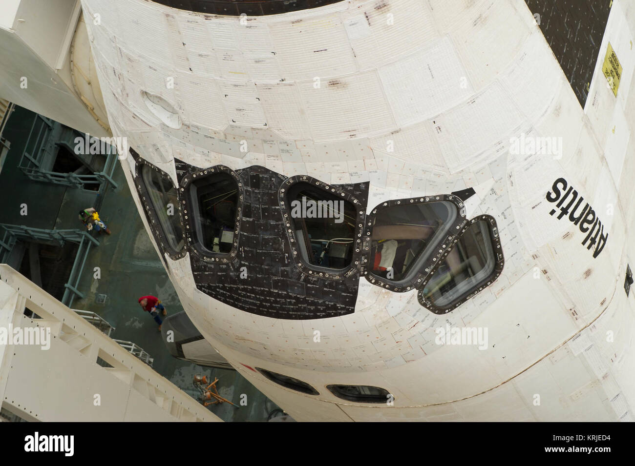 The space shuttle Atlantis is revealed as the rotating service ...