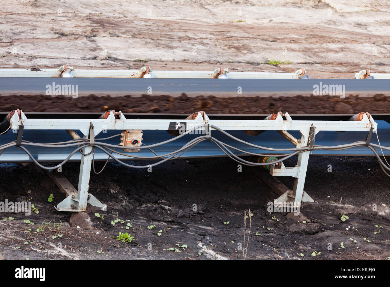 Open pit. Opencast brown coal mine. Belt conveyor as industrial detail ...