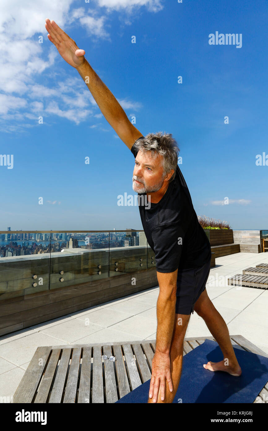 Mature man standing rooftop hi-res stock photography and images - Alamy
