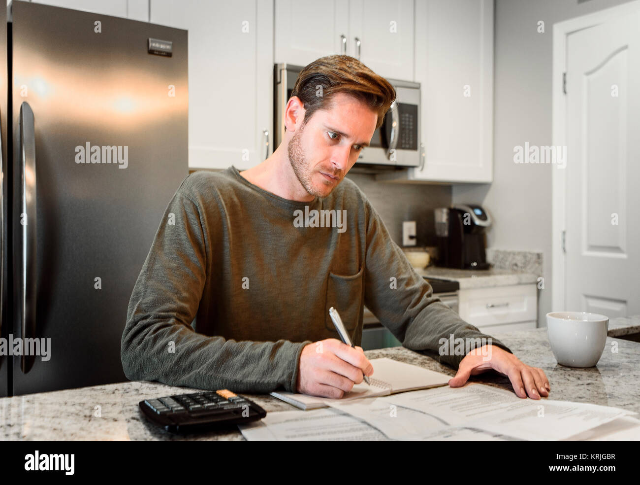 Seated writing man hi-res stock photography and images - Alamy