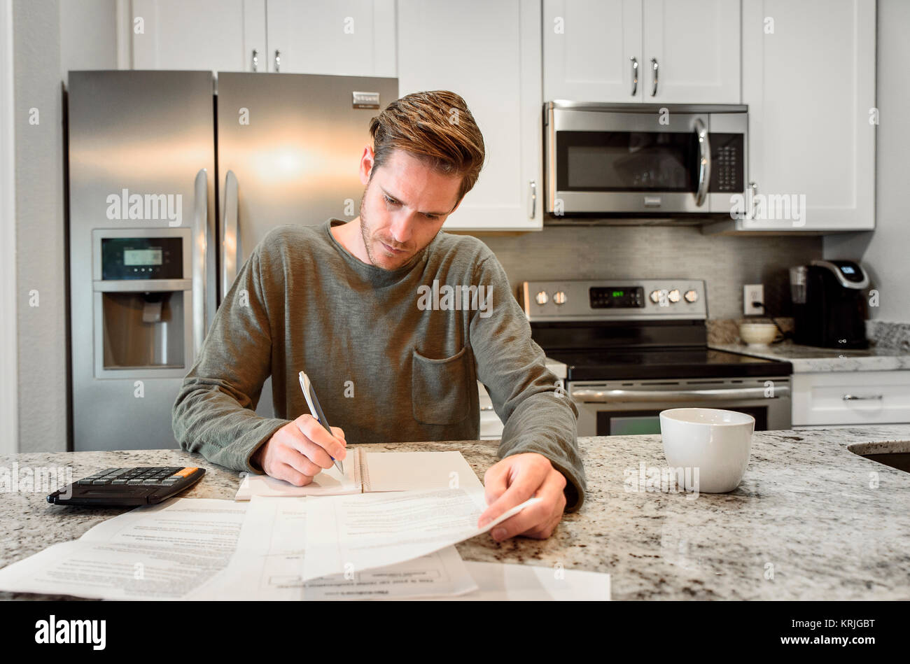 Seated writing man hi-res stock photography and images - Alamy