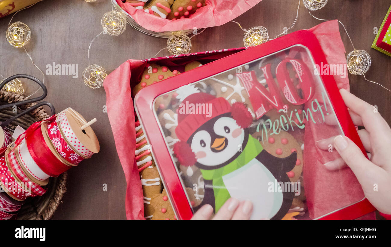 Packaging traditional home made gingerbread cookies as food gifts Stock ...
